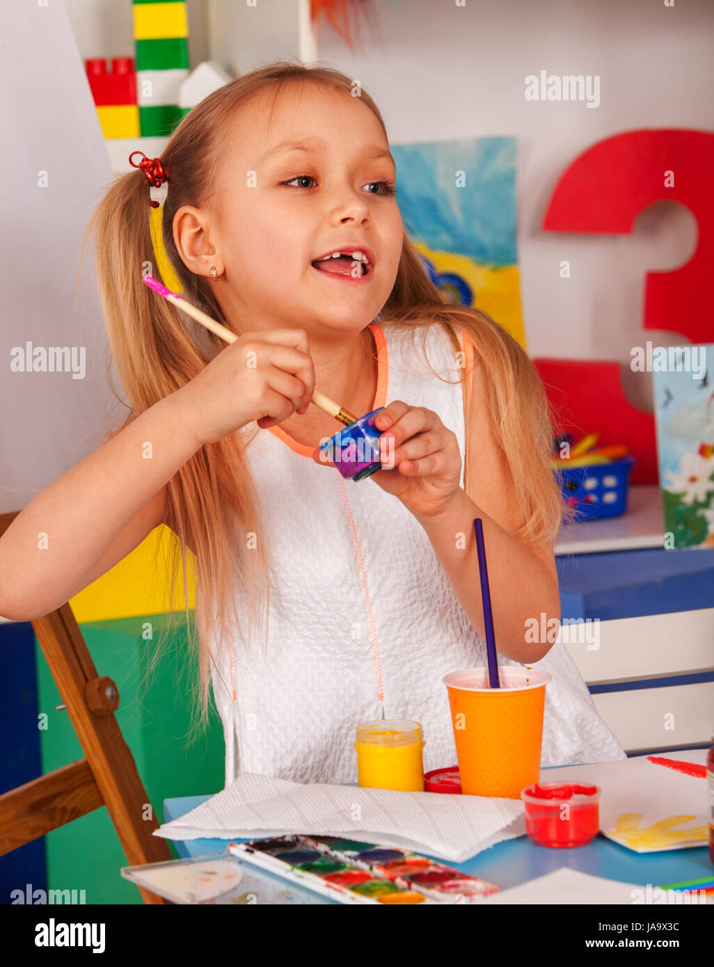 Small students children painting in art school class Stock Photo - Alamy