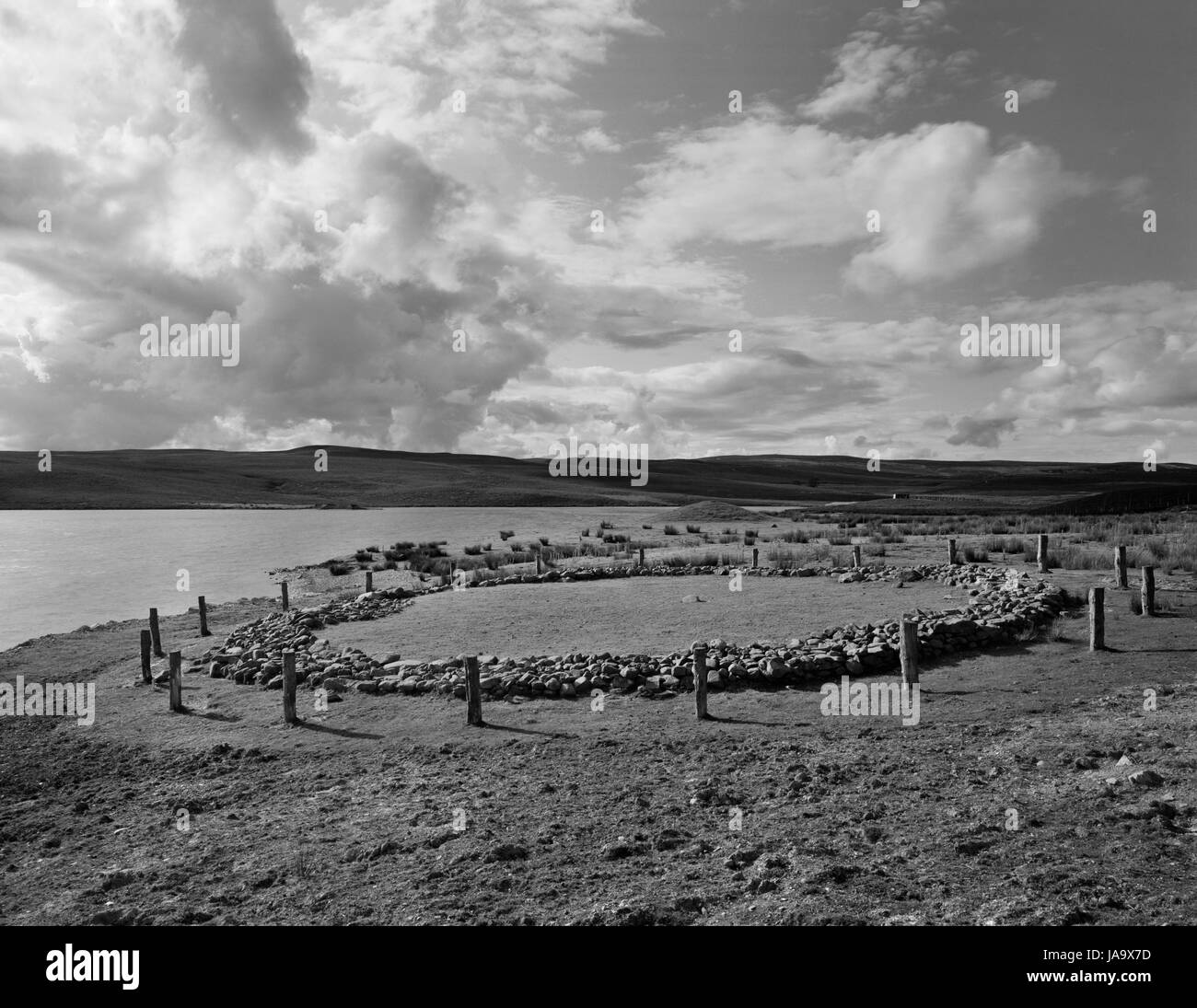View NNW of a reconstructed Bronze Age ring cairn (44) with round ...