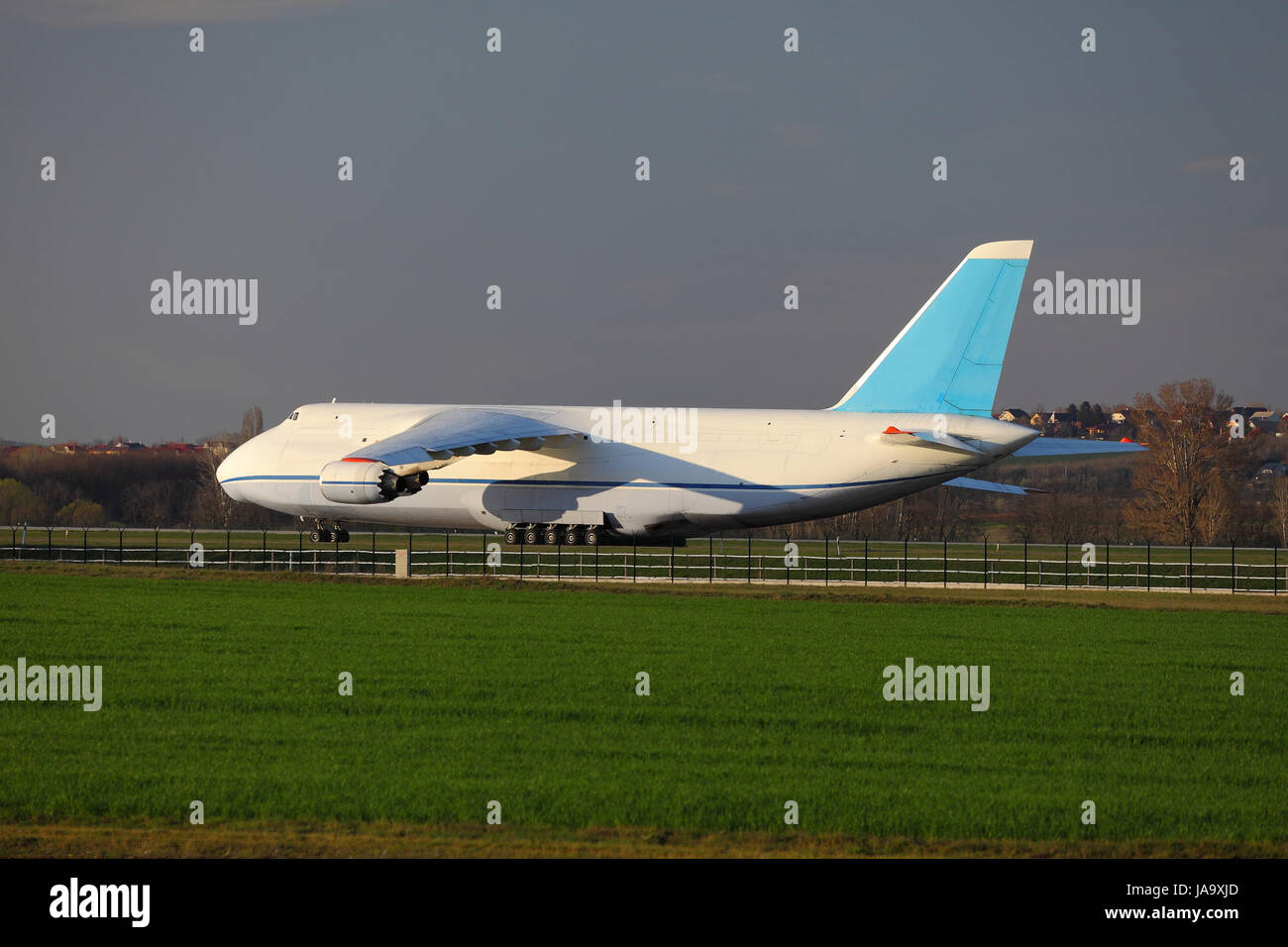 Huge cargo plane on the runway Stock Photo - Alamy