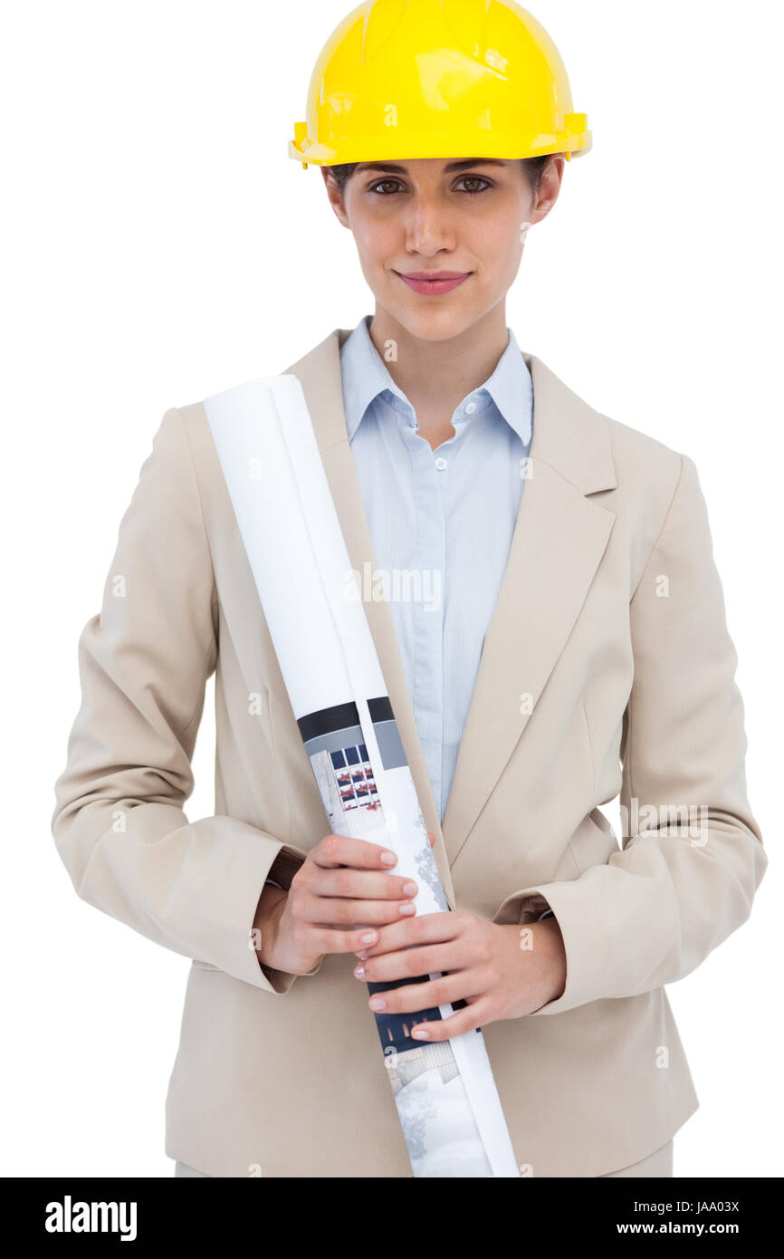 Architect posing with hard hat and plan on white background Stock Photo ...