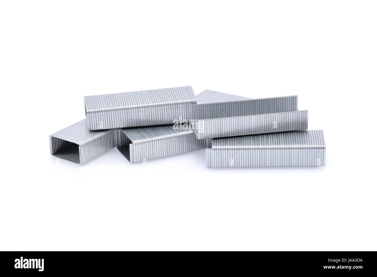Stack of metal staples isolated on white background Stock Photo - Alamy