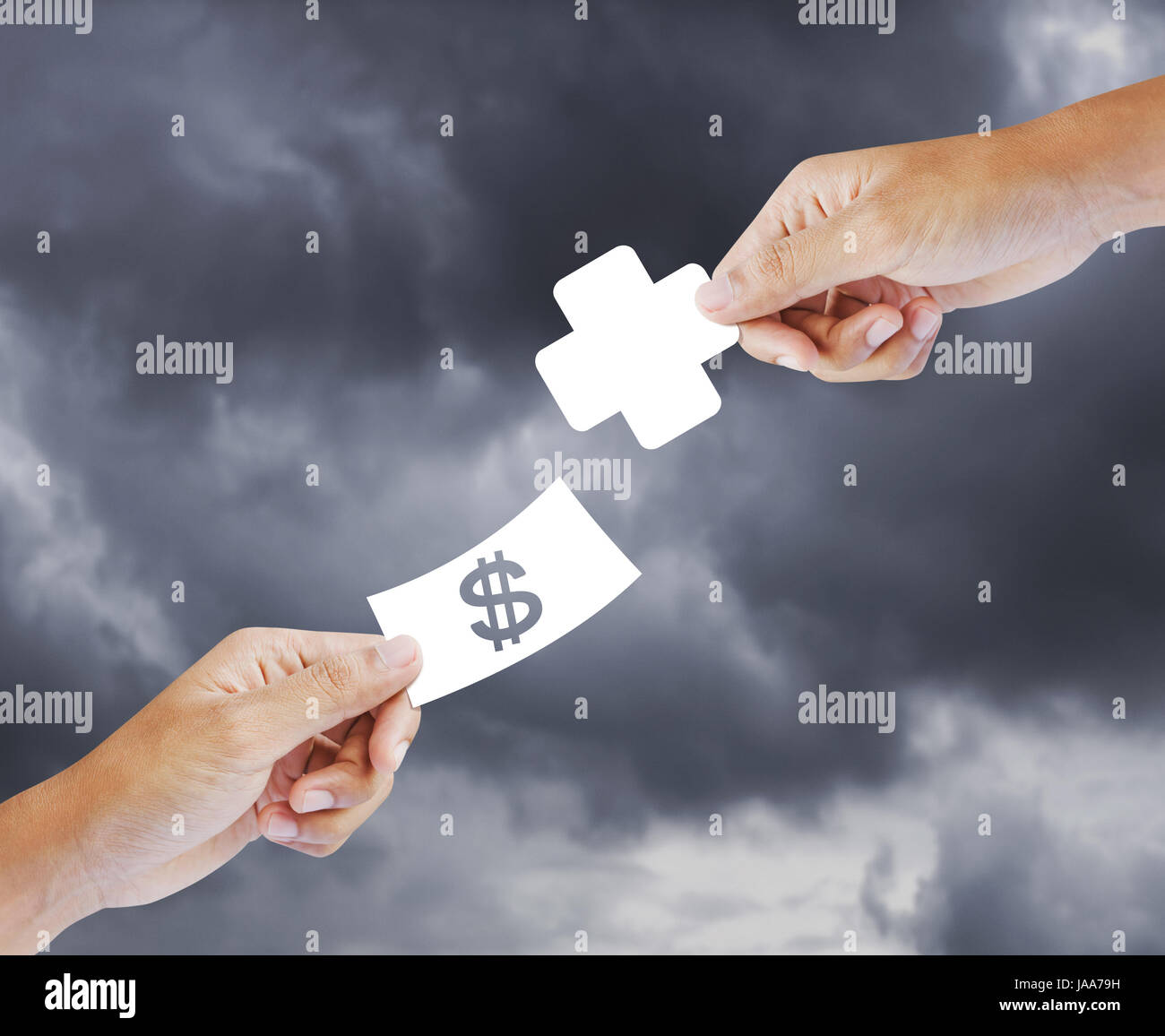 Hand with paper money and white cross Stock Photo - Alamy