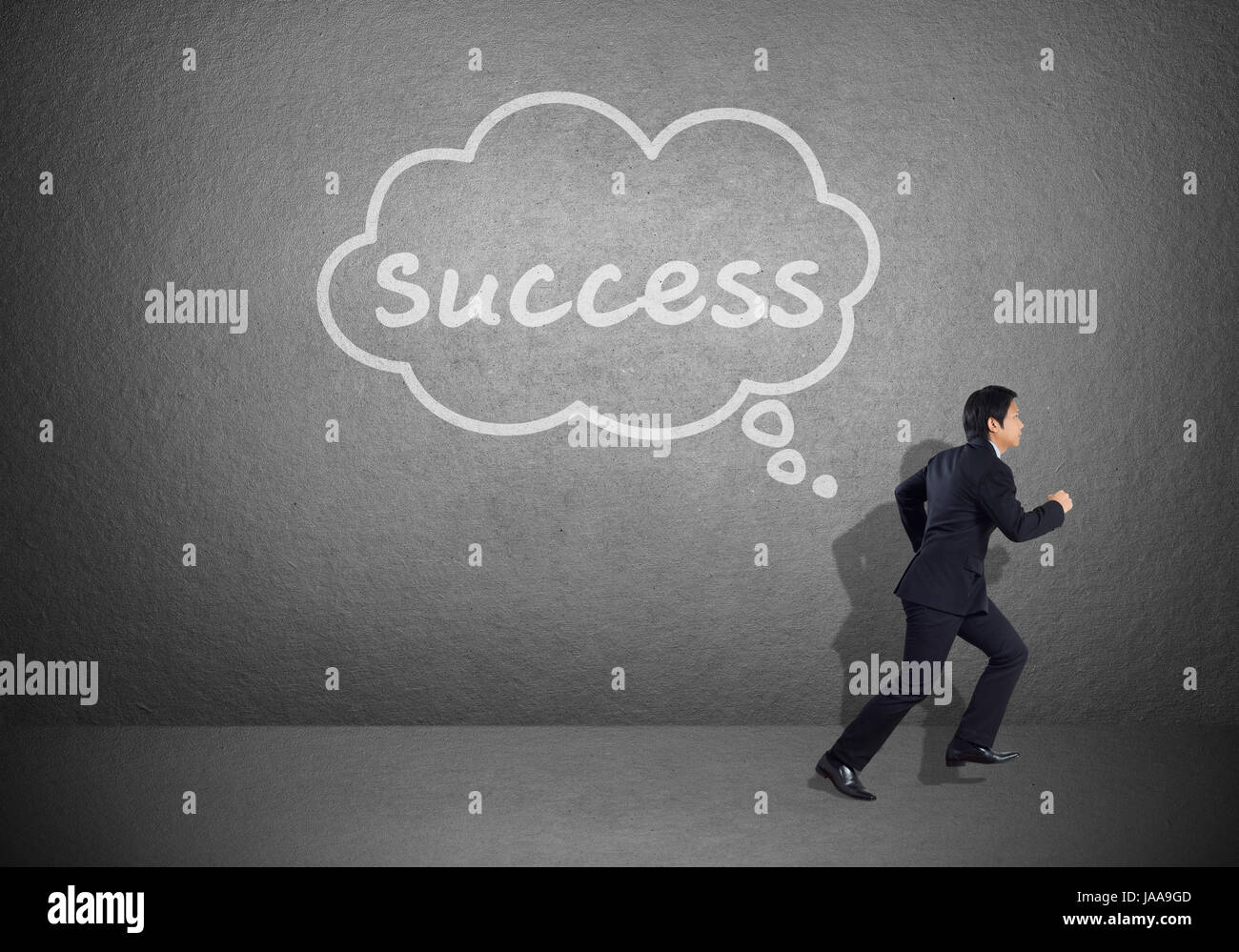 businessman run to success Stock Photo - Alamy