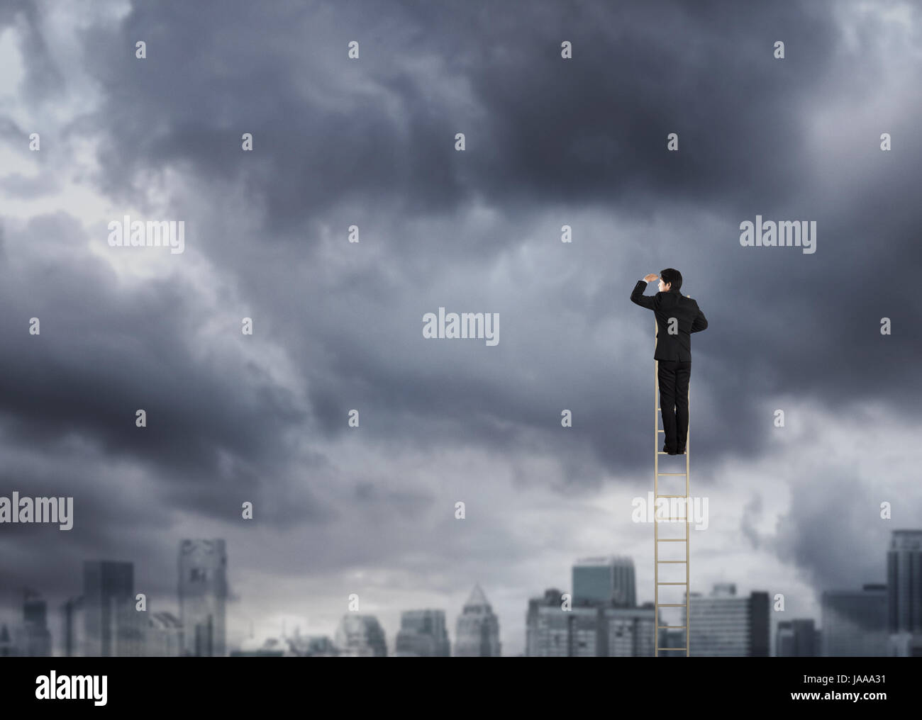 Boy standing on ladder hi-res stock photography and images - Alamy