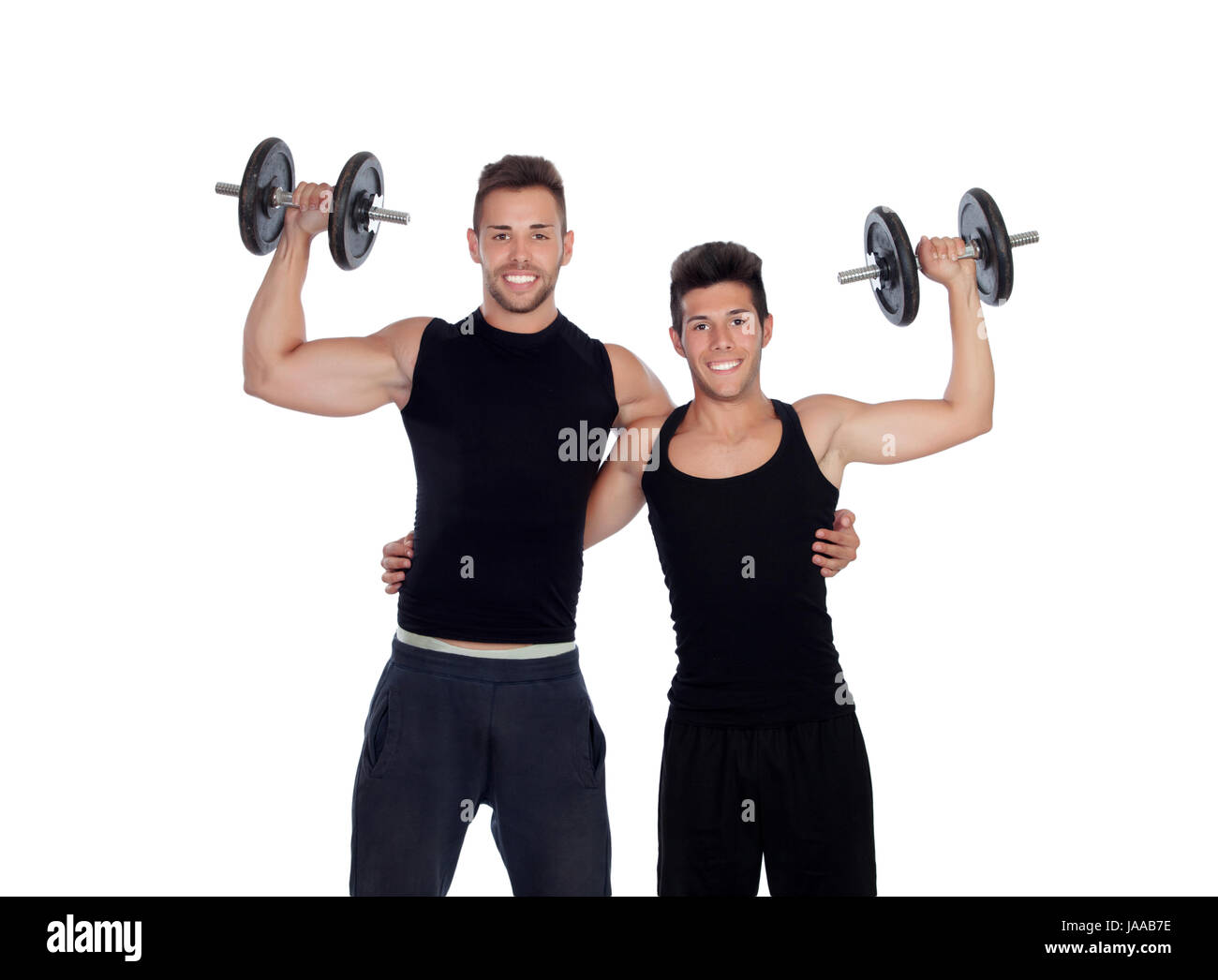 Two friends training with dumbbells isolated on a white background ...