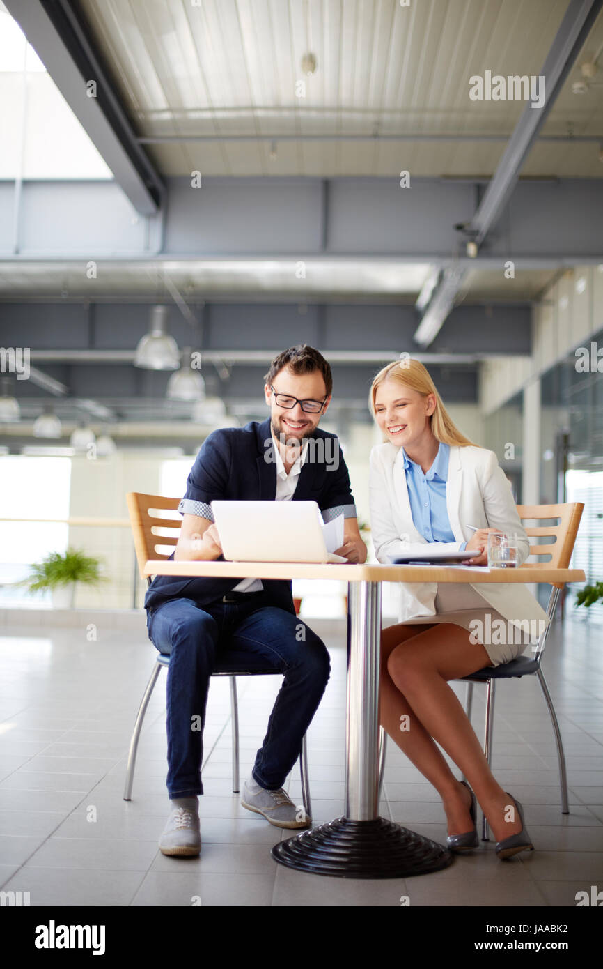 Two business people networking at meeting Stock Photo - Alamy