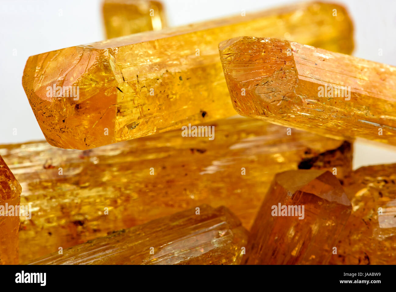 Detail of brazilian Imperial Topaz crystal with its texture, colors and ...