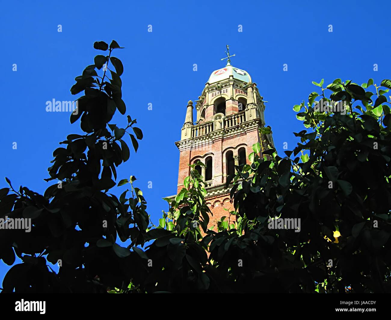 A photograph of a church bell tower detailing its unique architectural ...