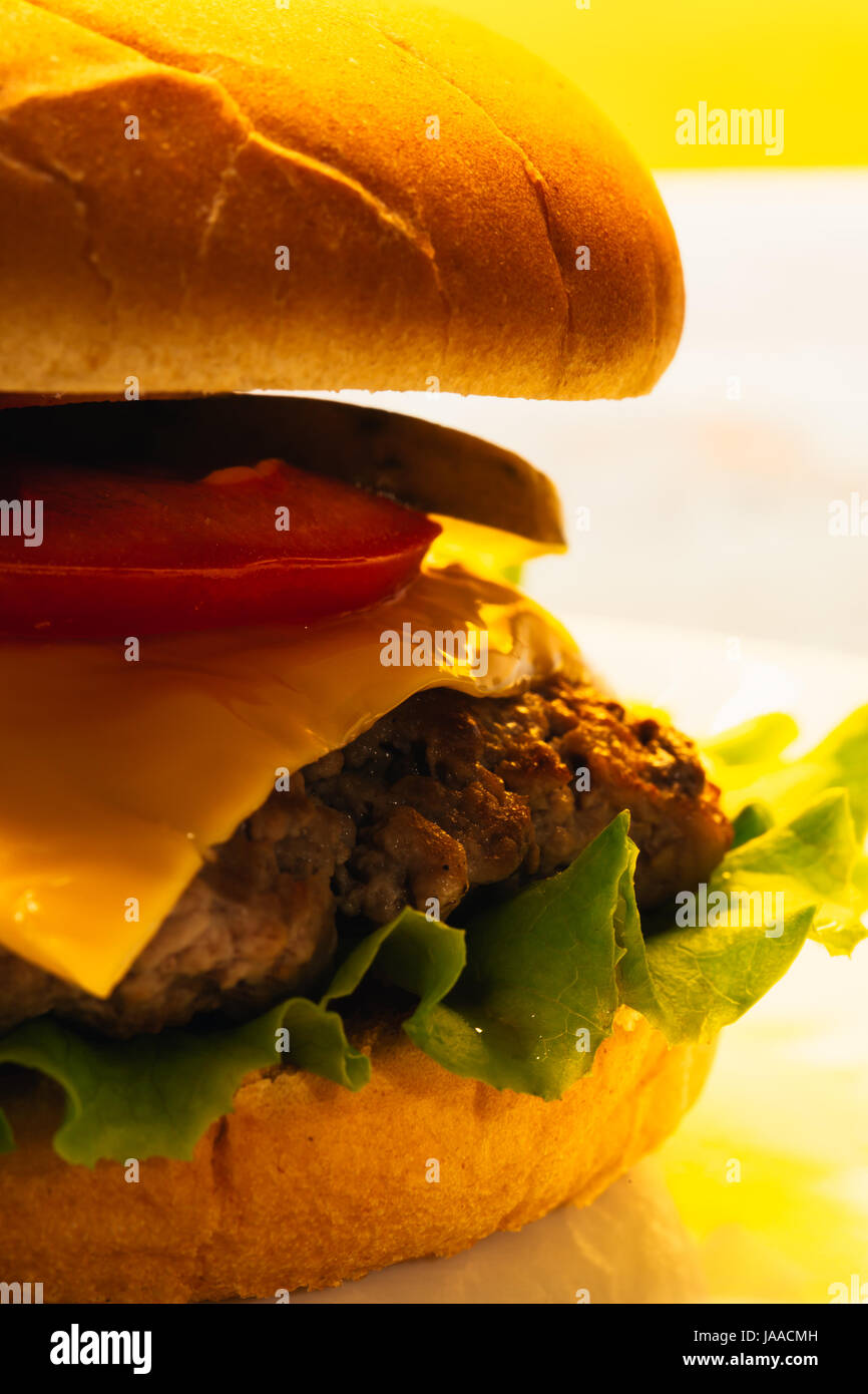 Cheeseburger close-up on a plate Stock Photo - Alamy