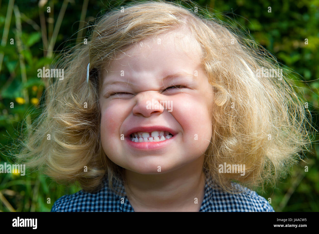 funny girl is grining Stock Photo - Alamy