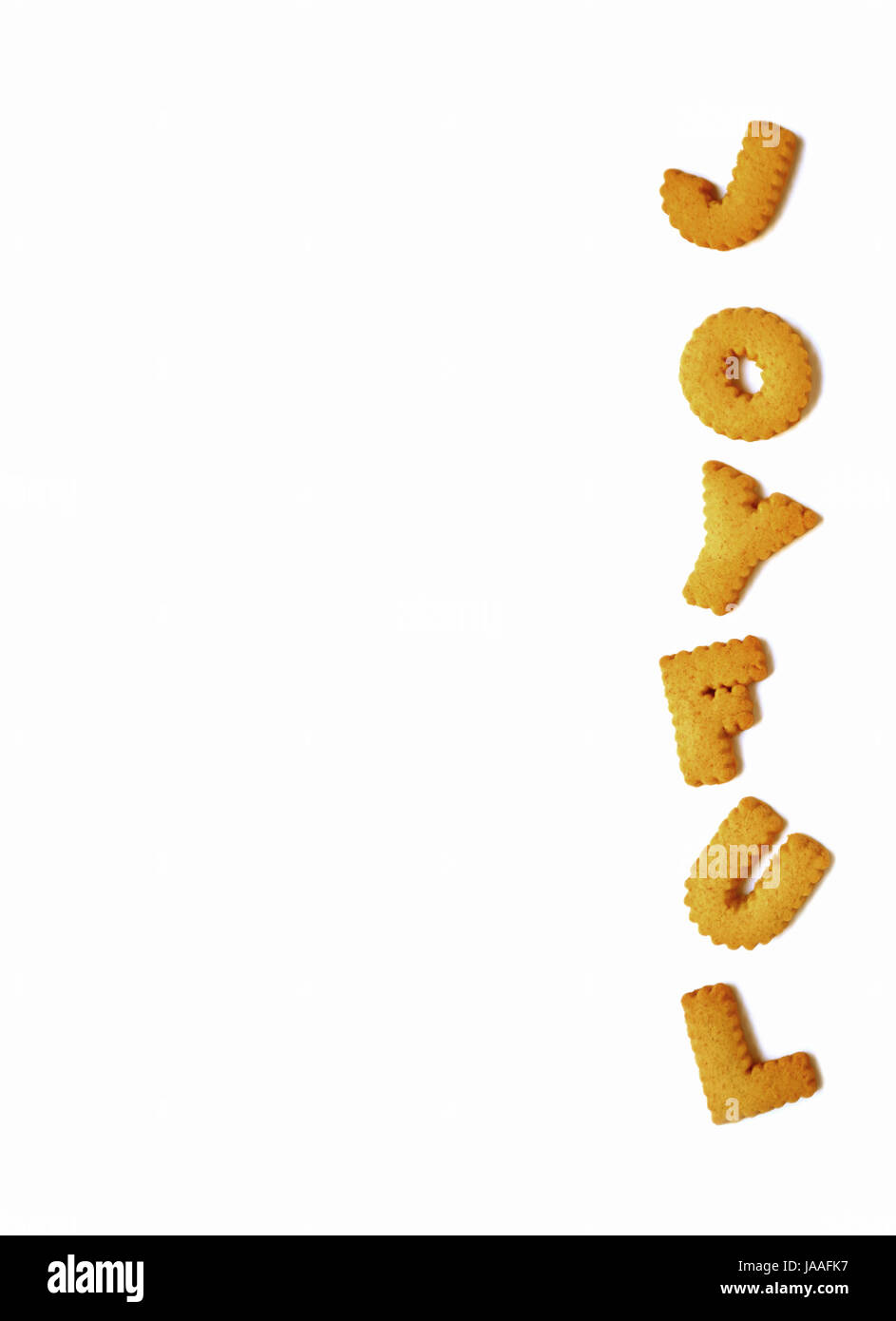 Top view of the word JOYFUL, made with alphabet shaped biscuits on ...