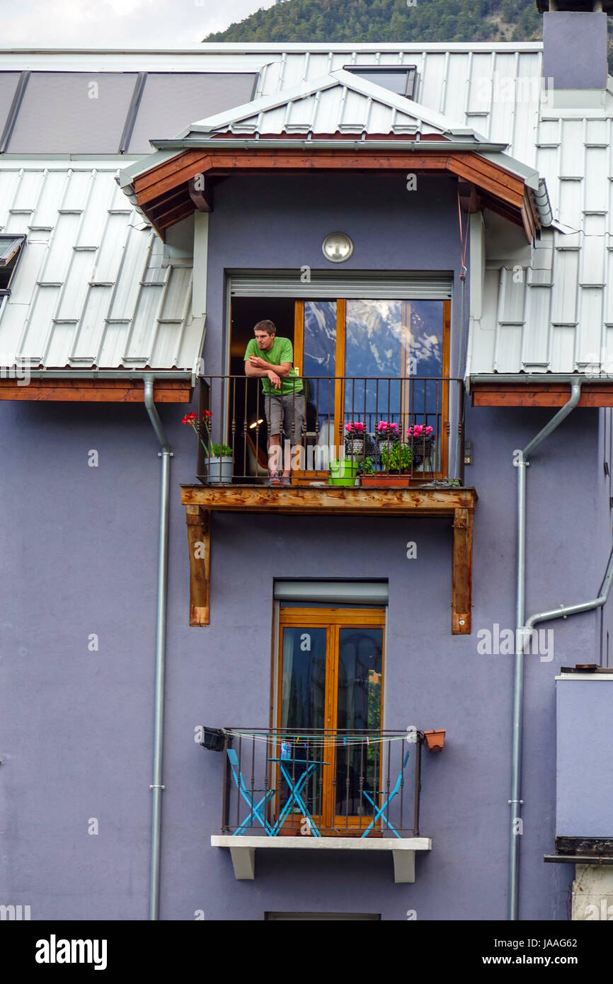 Men looking out balcony hi-res stock photography and images - Alamy