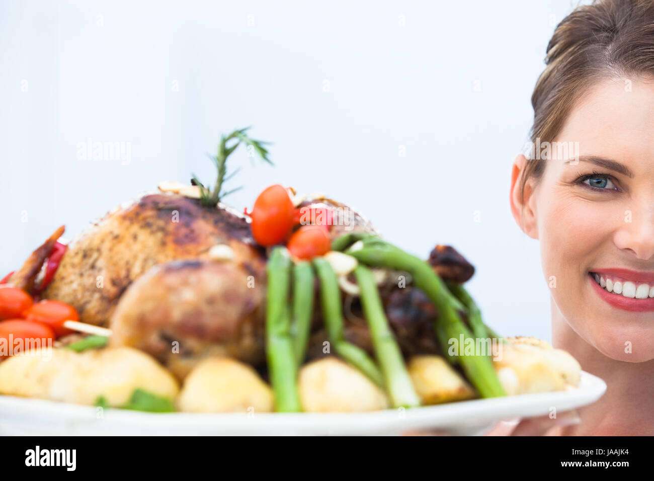 Woman roast chicken portrait hi-res stock photography and images - Alamy