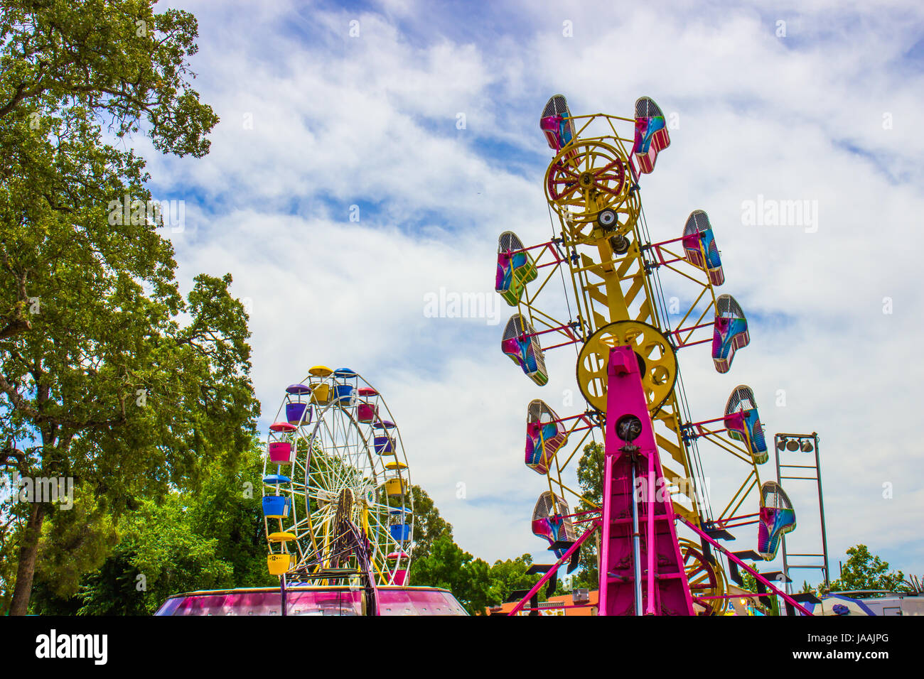 Two Amusement Rides At Local County Fair Stock Photo - Alamy
