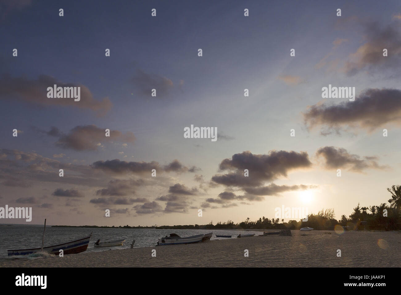 Sunset on the tropical island of mussulo angola Stock Photo - Alamy