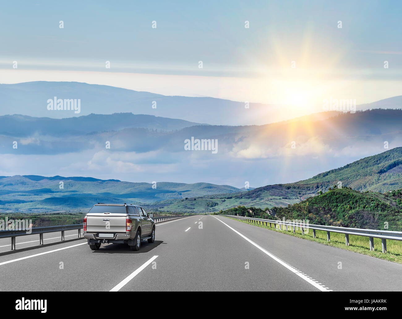 Car is driving on the high-speed highway, on the background of blue ...