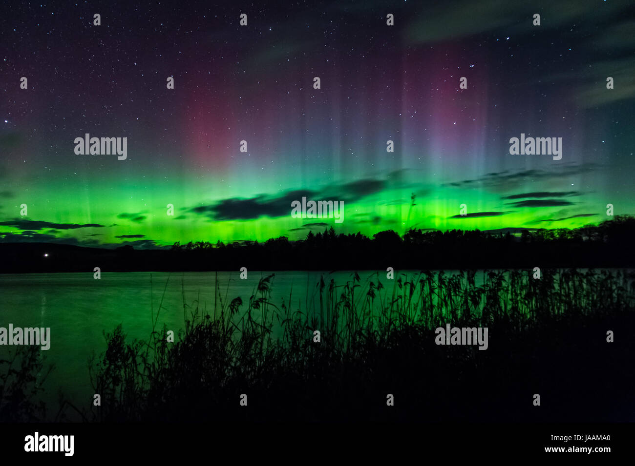 Aurora borealis or northern lights with milky way galaxy hi-res stock ...