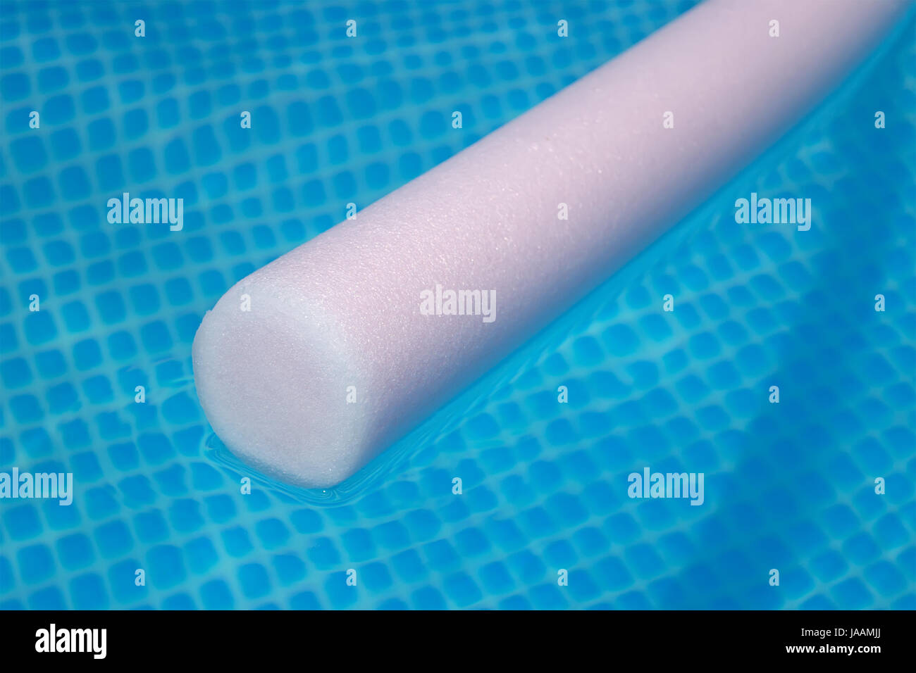 pink pool noodle and blue water Stock Photo - Alamy