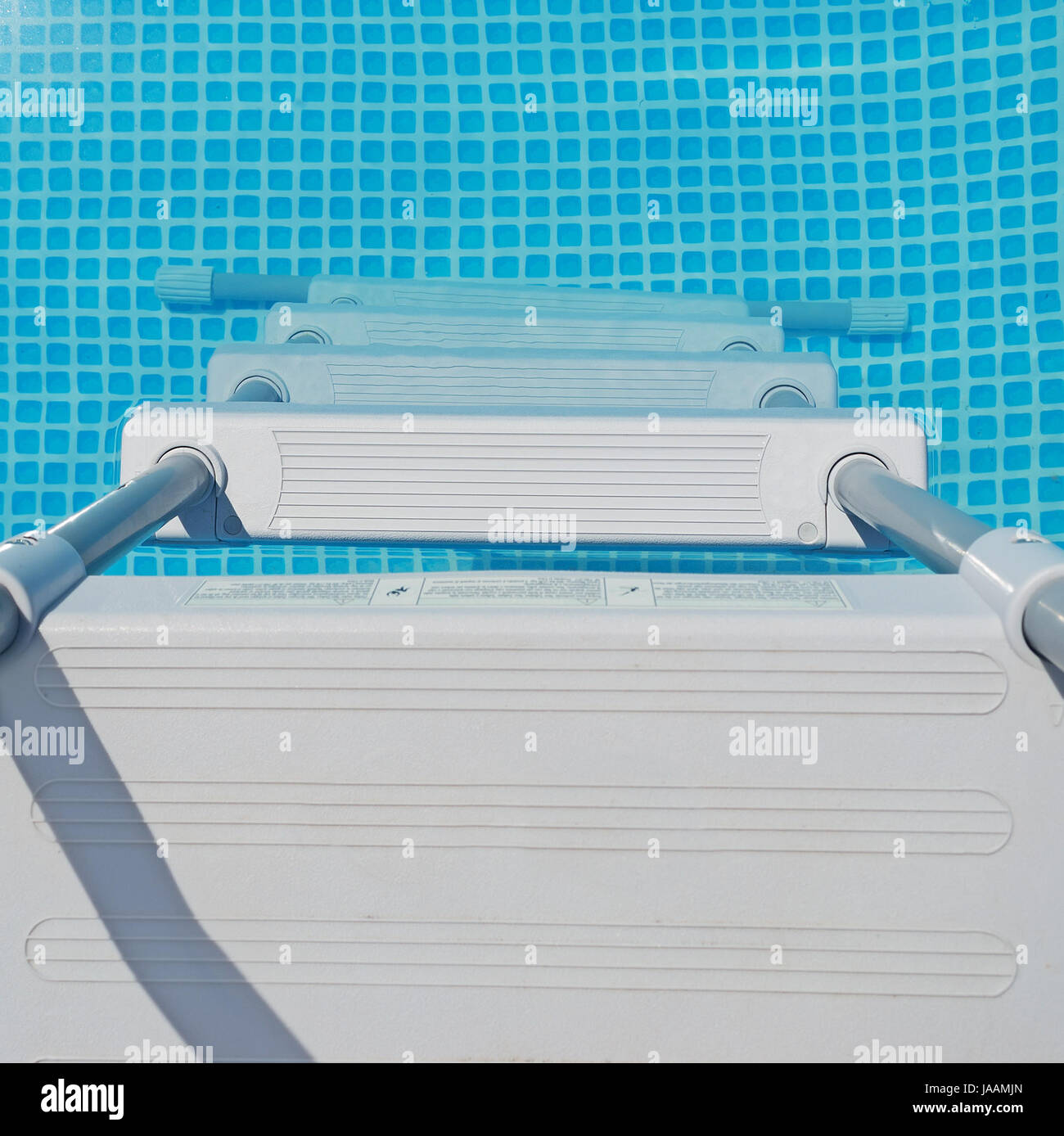 pool ladder and water seen from above Stock Photo - Alamy
