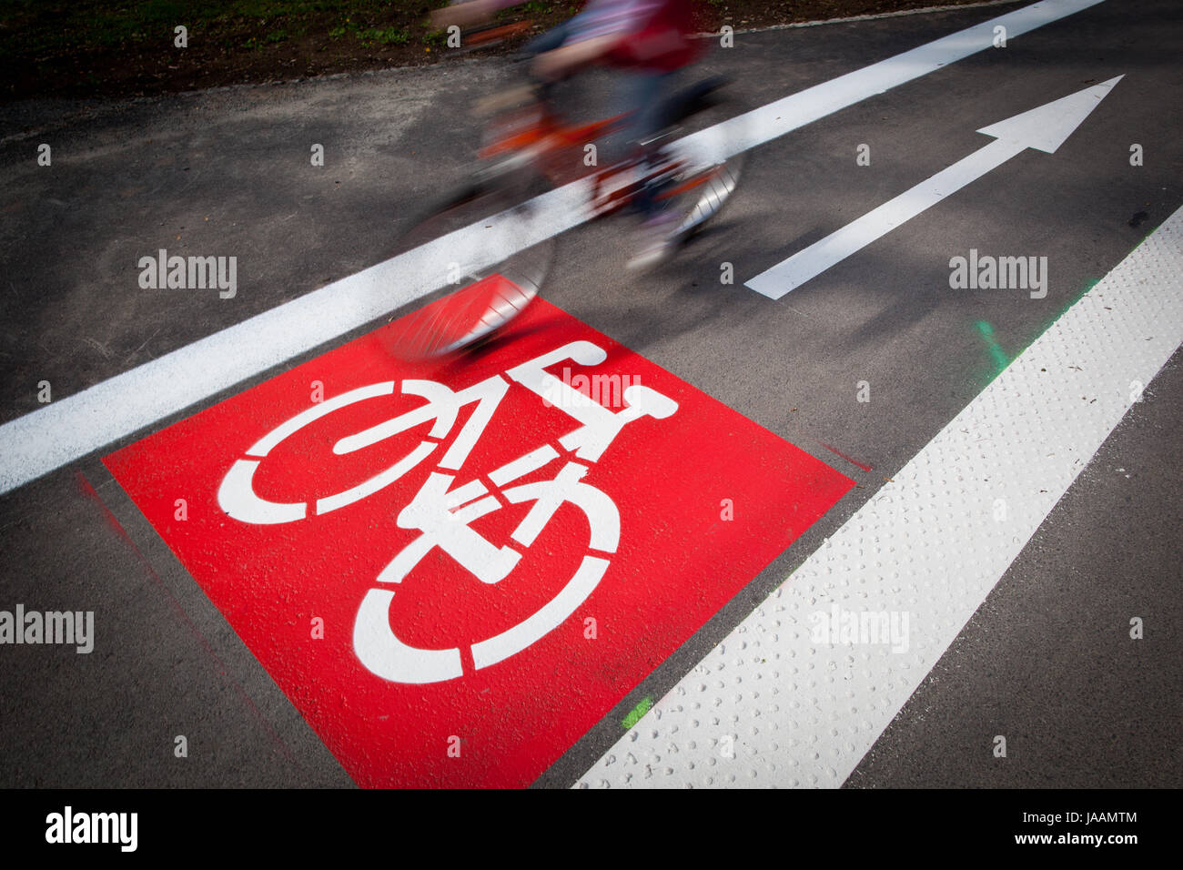 Urban traffic concept - bike/cycling lane sign in a city Stock Photo ...