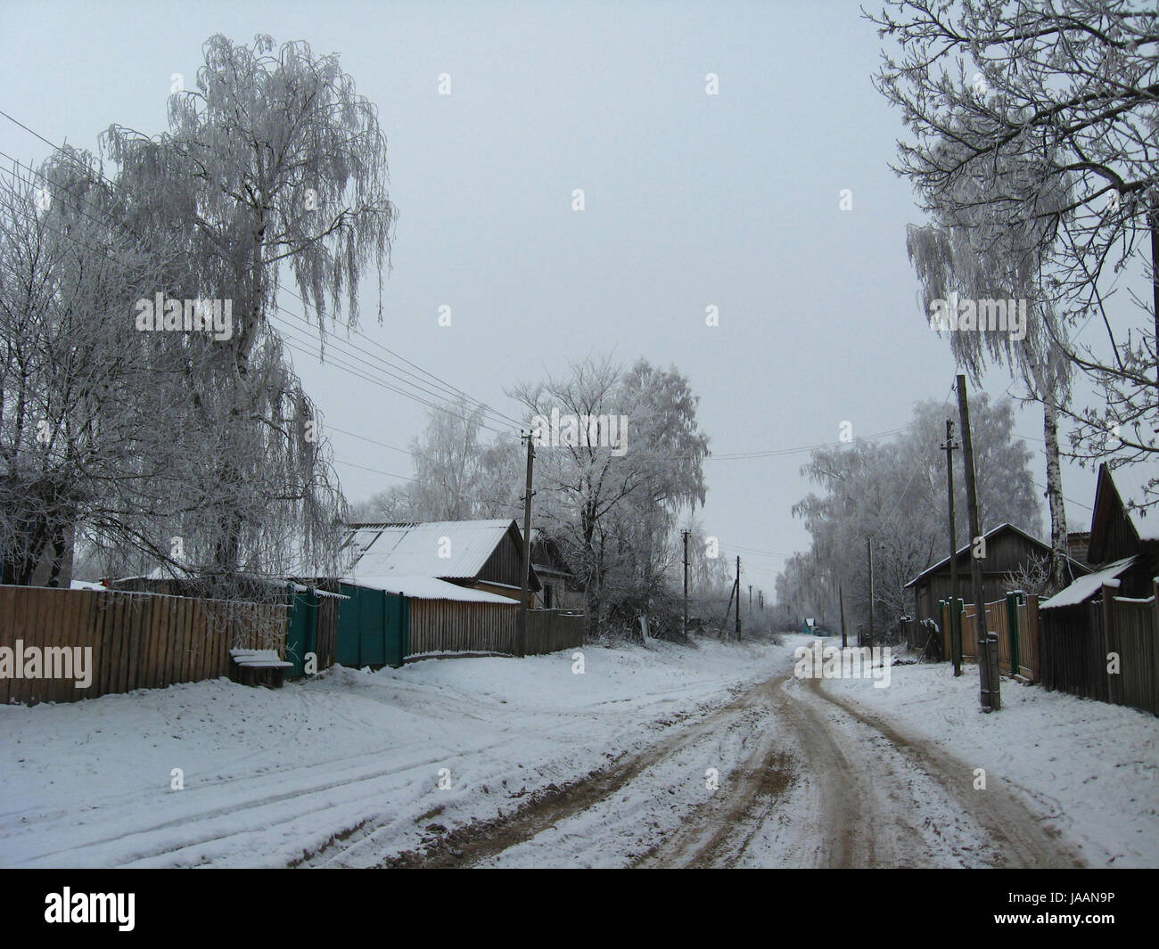 Winter landscape with rural street in snow Stock Photo - Alamy