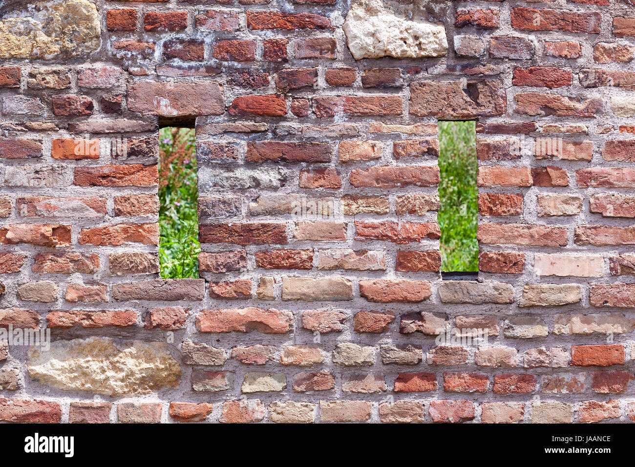Old brick and stone wall background Stock Photo - Alamy