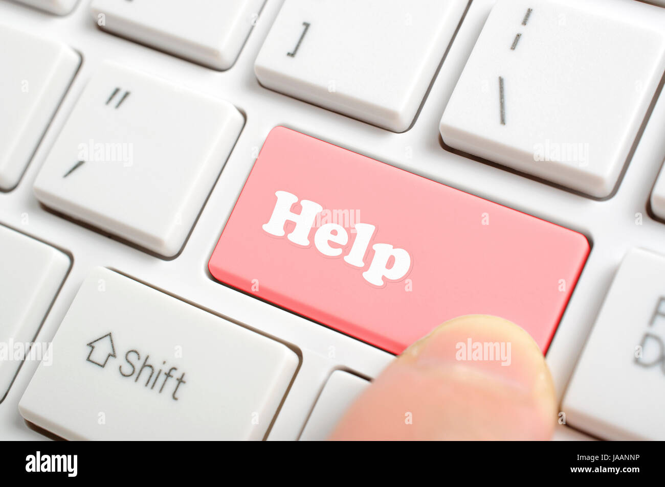 Pressing red help key on keyboard Stock Photo - Alamy