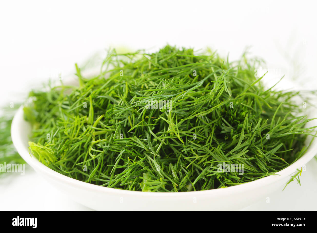 Bowl of fresh chopped dill leaves Stock Photo - Alamy