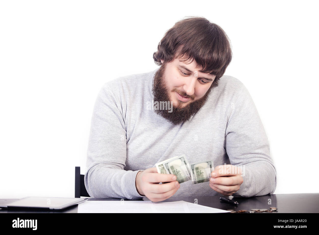 Money doesn't bring buy happiness. Close Up portrait young man holding ...