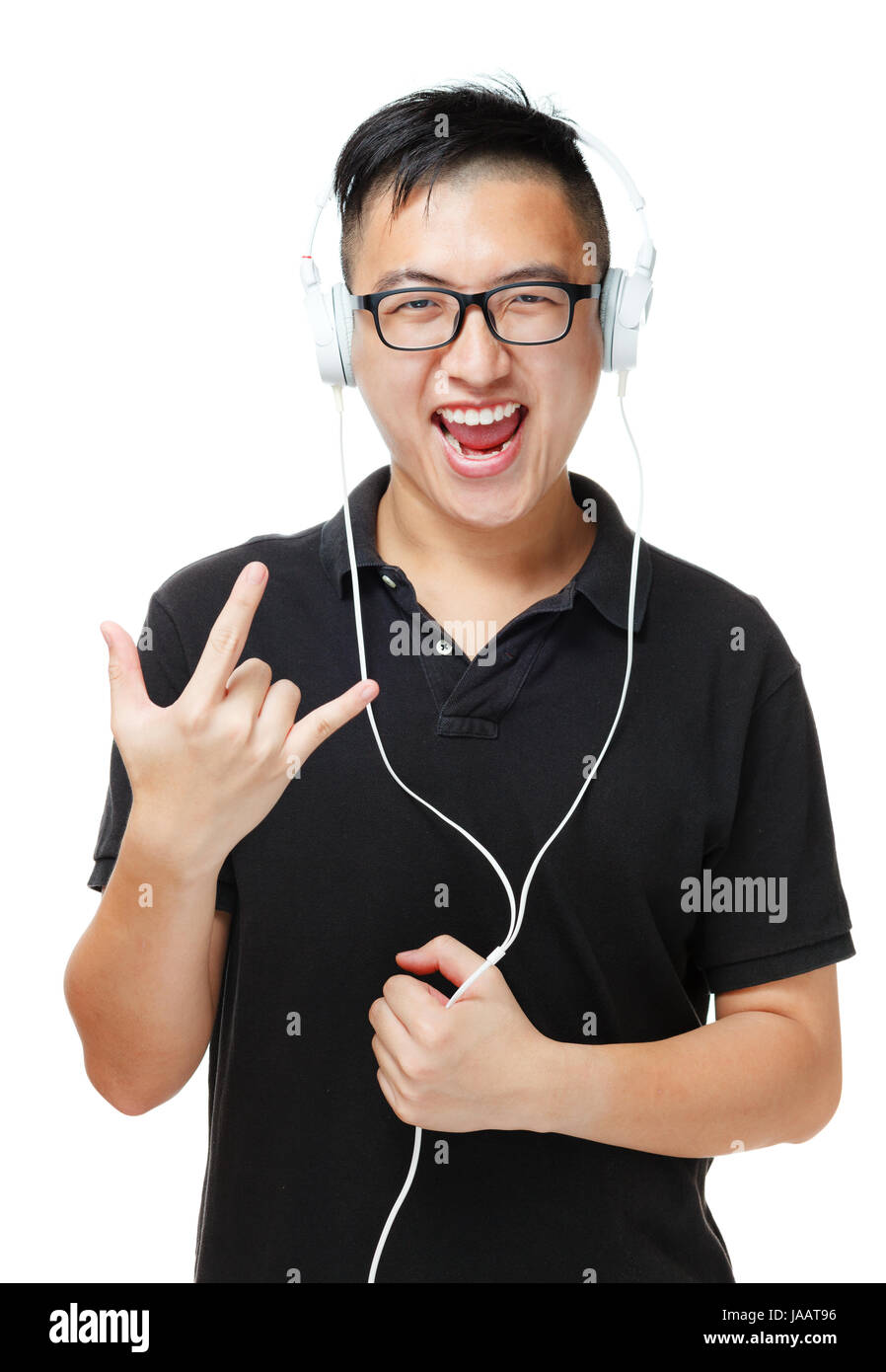 Asian man enjoy listen to music Stock Photo - Alamy