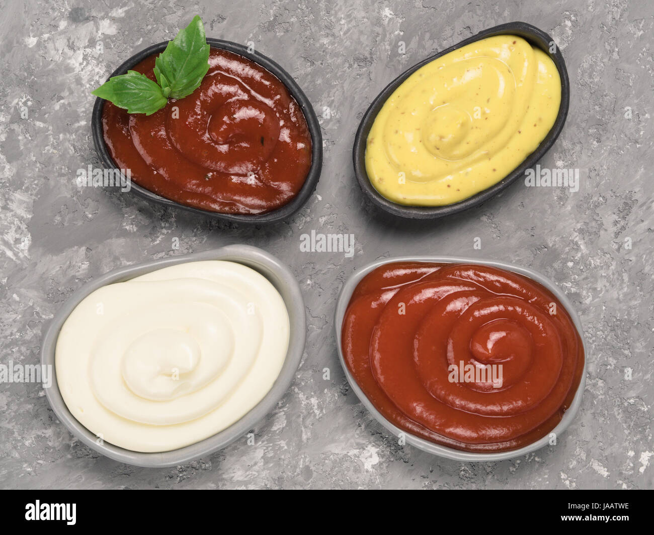 classic sauces set on gray background Stock Photo - Alamy