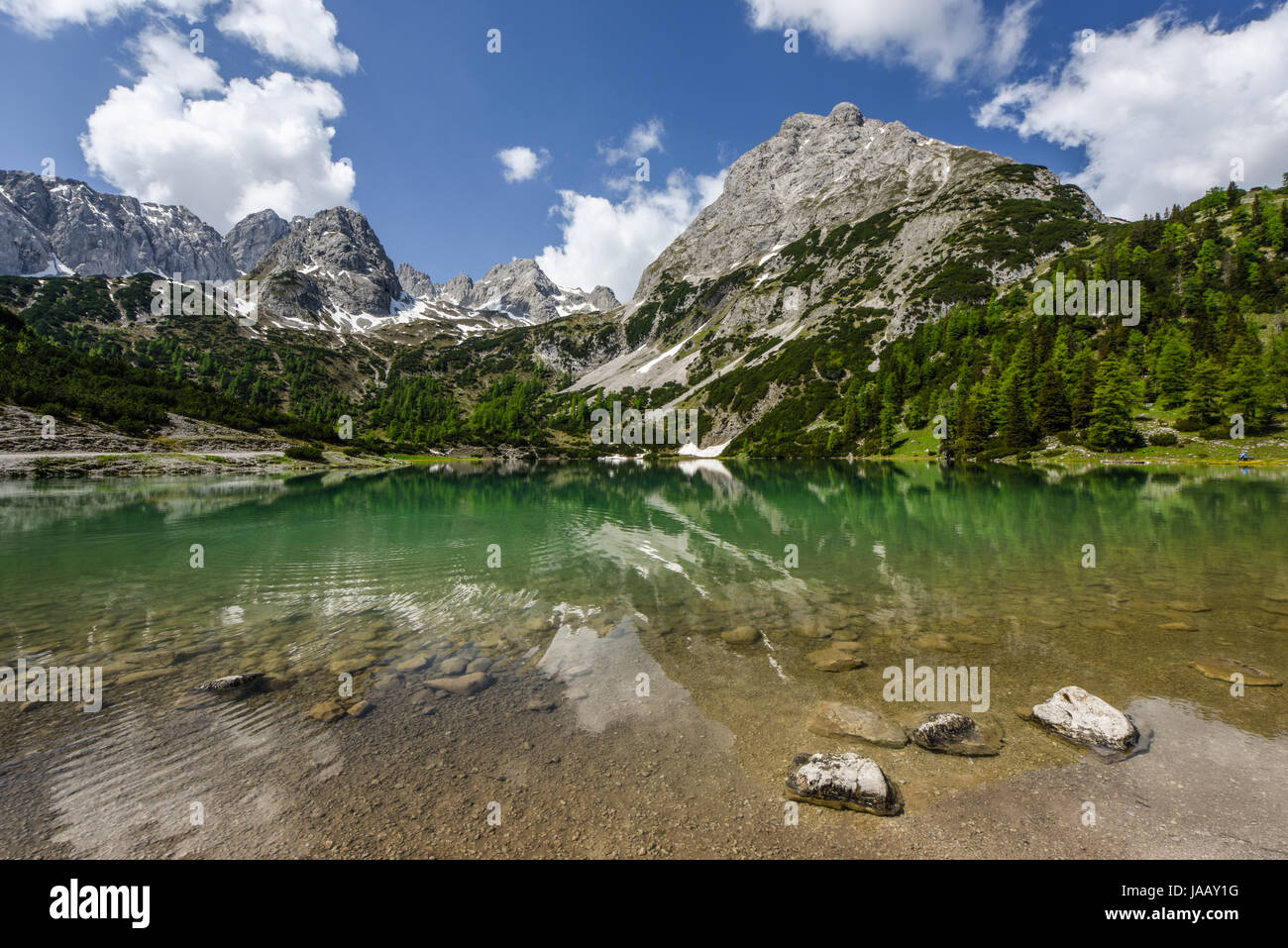 Scenic lake Seebensee with reflections in the turquoise water, Ehrwald ...