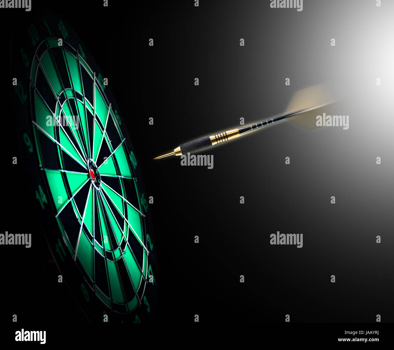 Shot of darts in bullseye on dartboard Stock Photo - Alamy