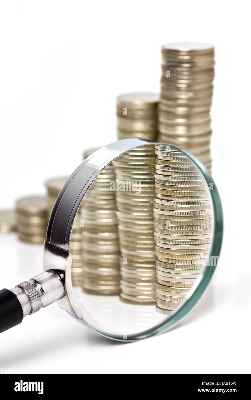 Magnifying glass stacks coins hi-res stock photography and images - Alamy