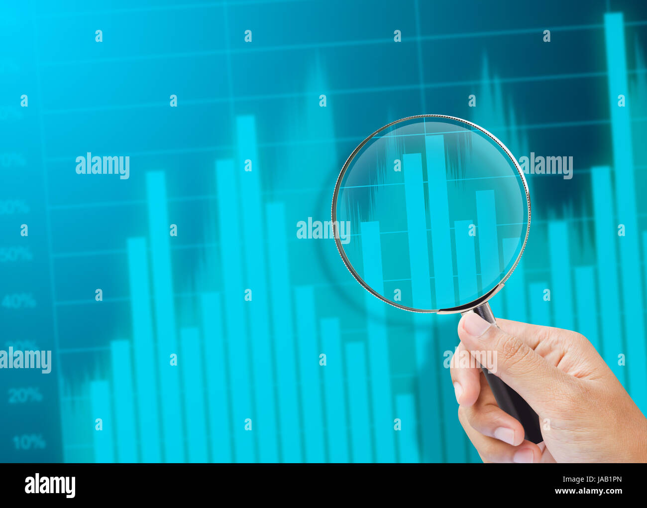 magnifying glass zoom on a business chart Stock Photo - Alamy