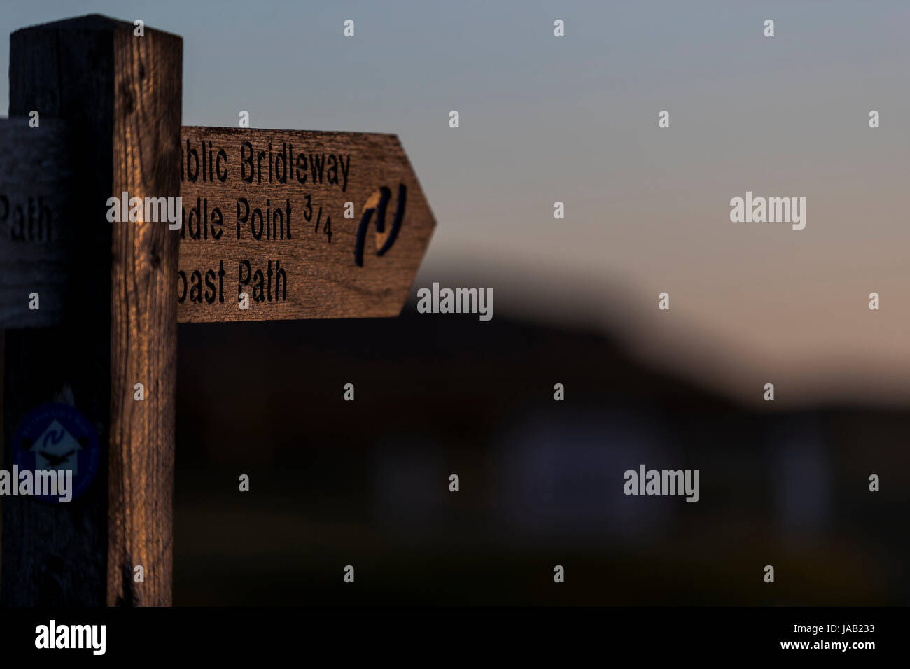 Northumberland Coast Path fingerpost sign at Bamburgh, Northumberland ...