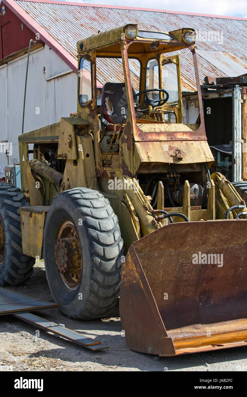 Old rusty wheel loader Stock Photo - Alamy