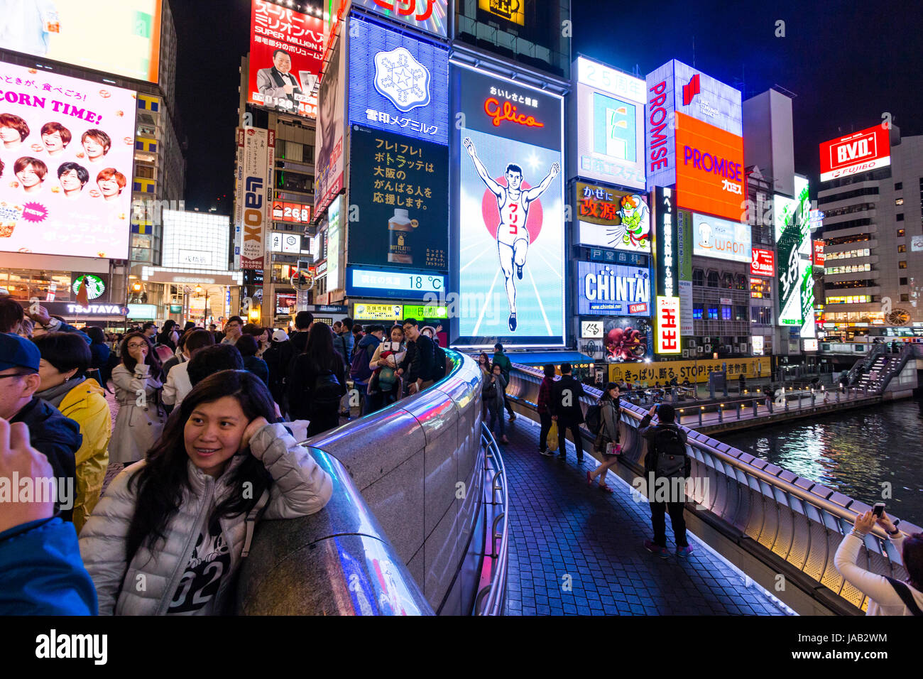Famous Ebisu bridge in Dotonbori, crowded with tourists and sightseers ...