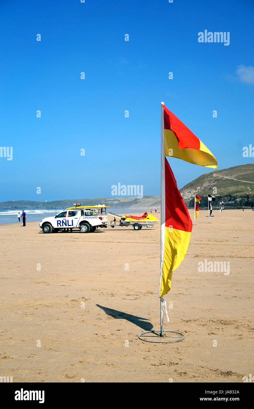Red and yellow flags on beach uk hi-res stock photography and images ...