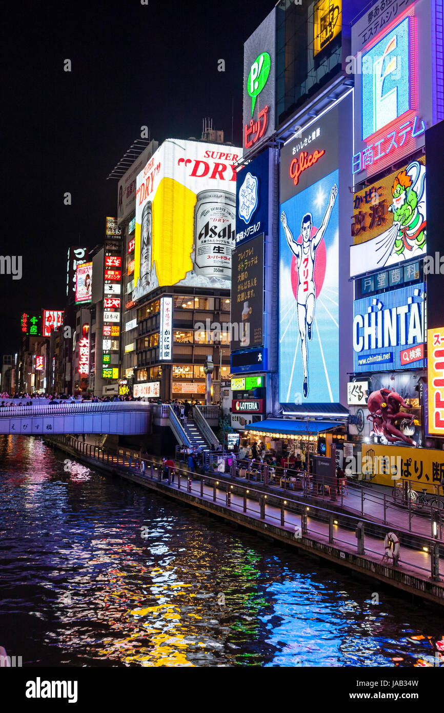 Osaka at night, Dotonbori at night. The Ebisu bridge and massive famous ...