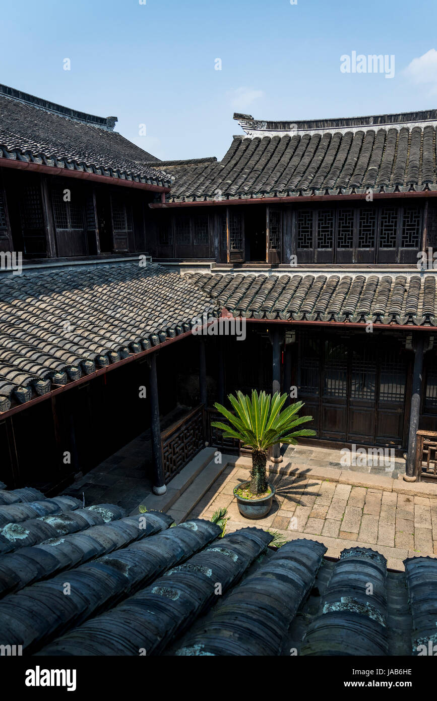 Atrium with palm tree, Happy Farming Hall, Ancient water town of Tongli ...