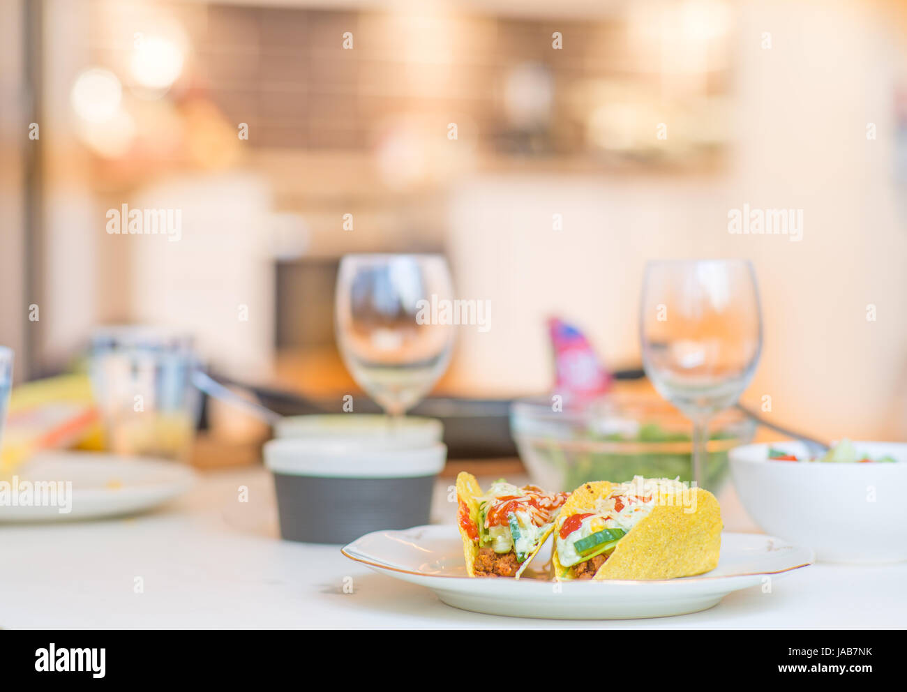 A plate of vegetarian taco's on a dinner table Stock Photo - Alamy