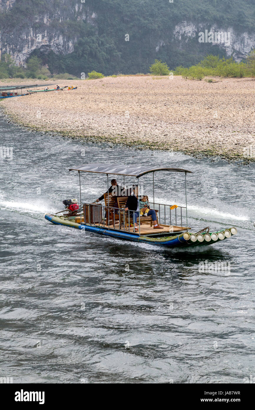 Li River Cruise, Guangxi Region, China. Family of Three Going Upriver ...