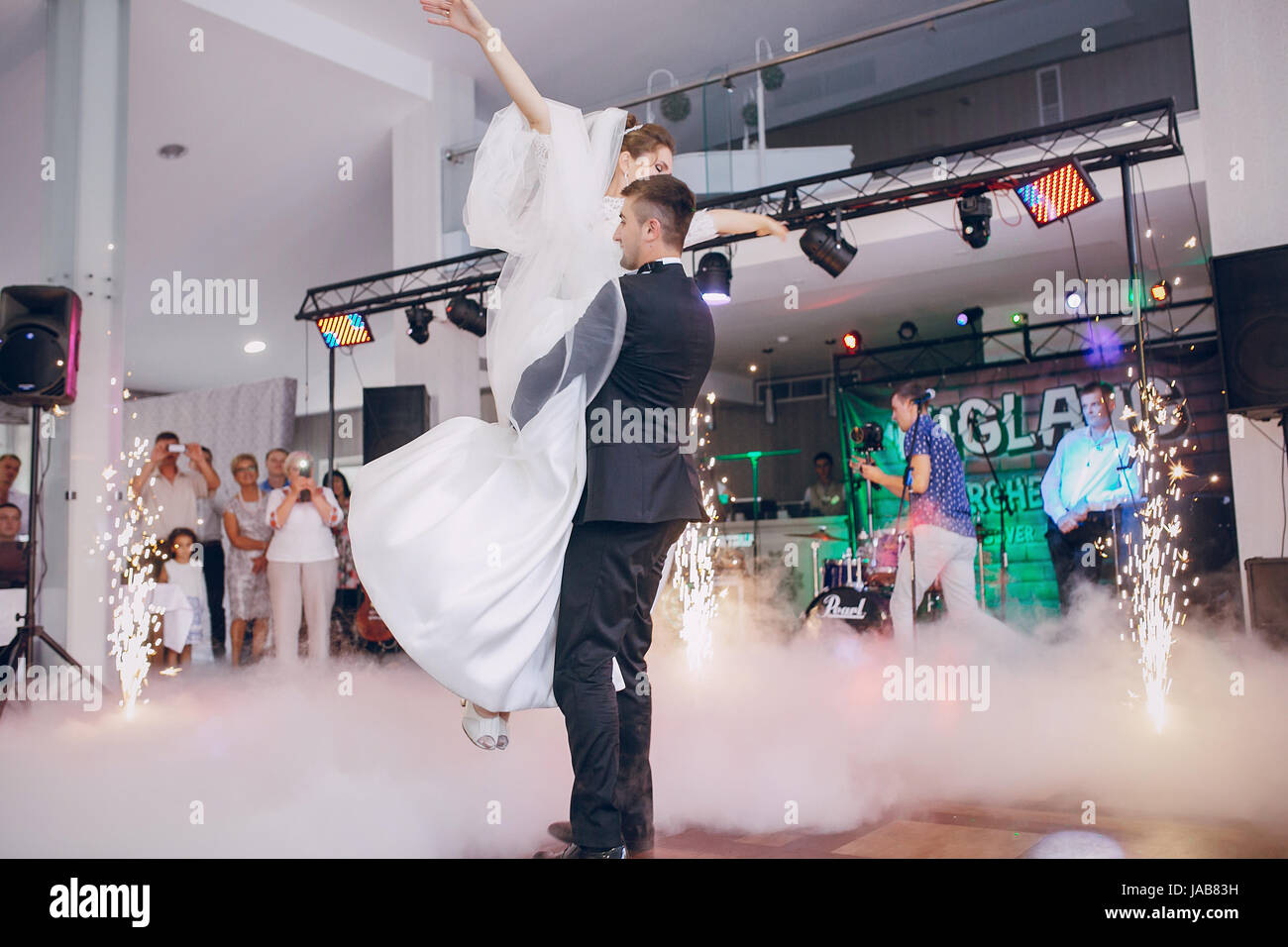 bride and groom dancing at the restaurant of their first dance Stock ...