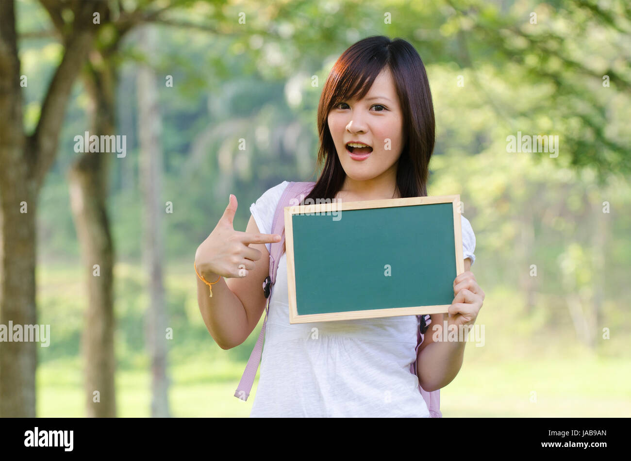 asian chinese college female student with campus background Stock Photo ...