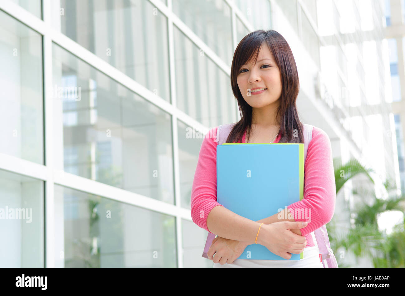 asian chinese college female student with campus background Stock Photo ...