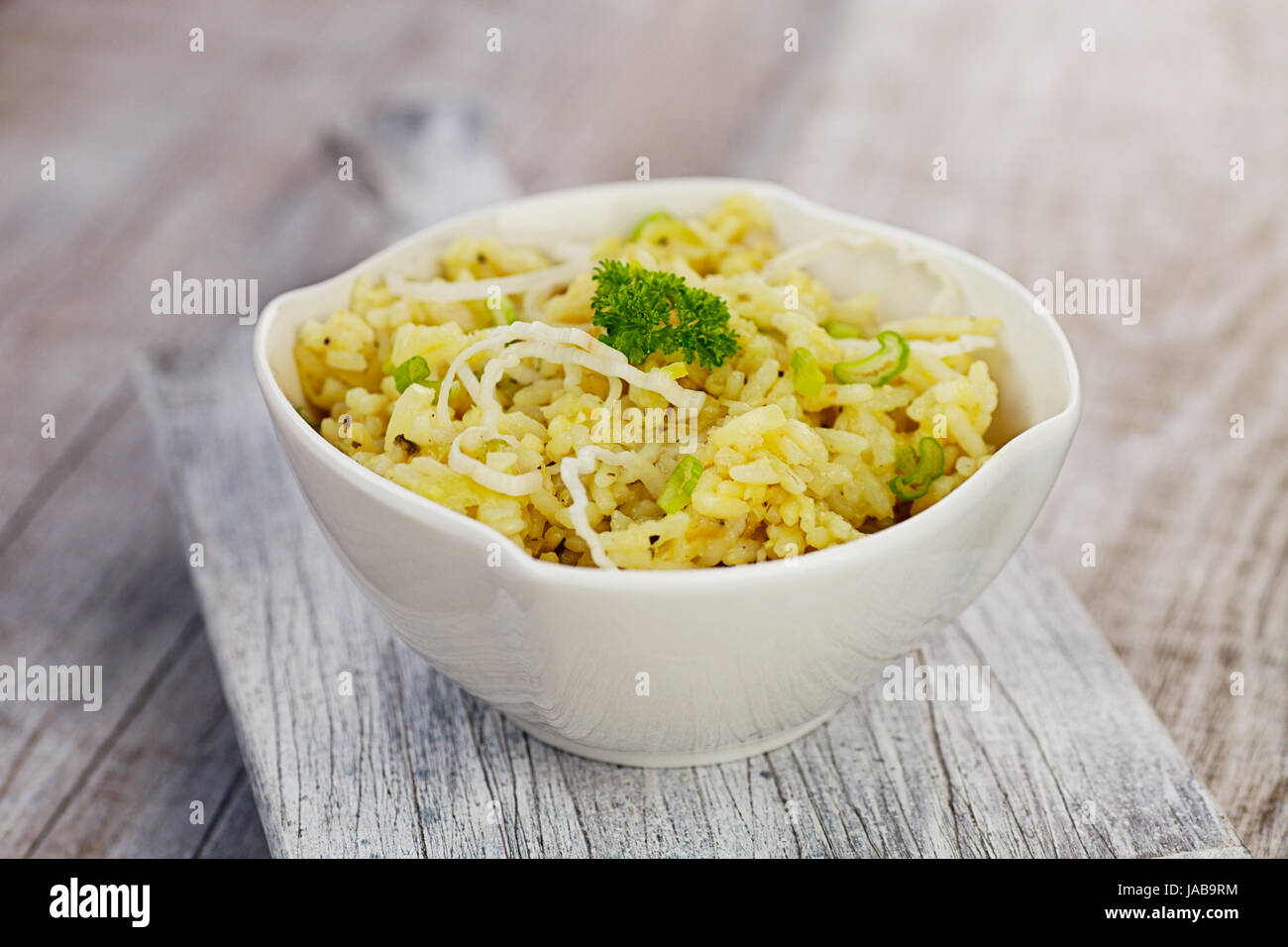 Vegetarian food. Leek risotto with garnish Stock Photo - Alamy