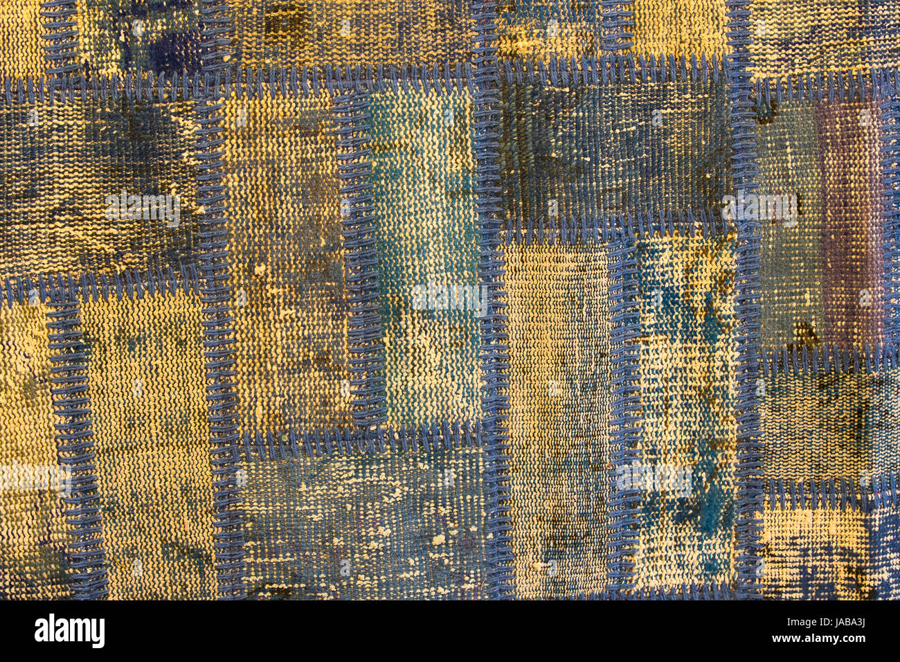 Texture of a piece of old carpet to sew thick threads Stock Photo - Alamy