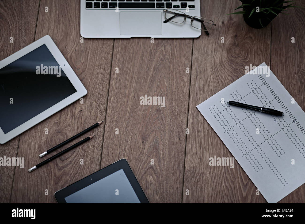 Office workplace with a laptop and documents Stock Photo - Alamy