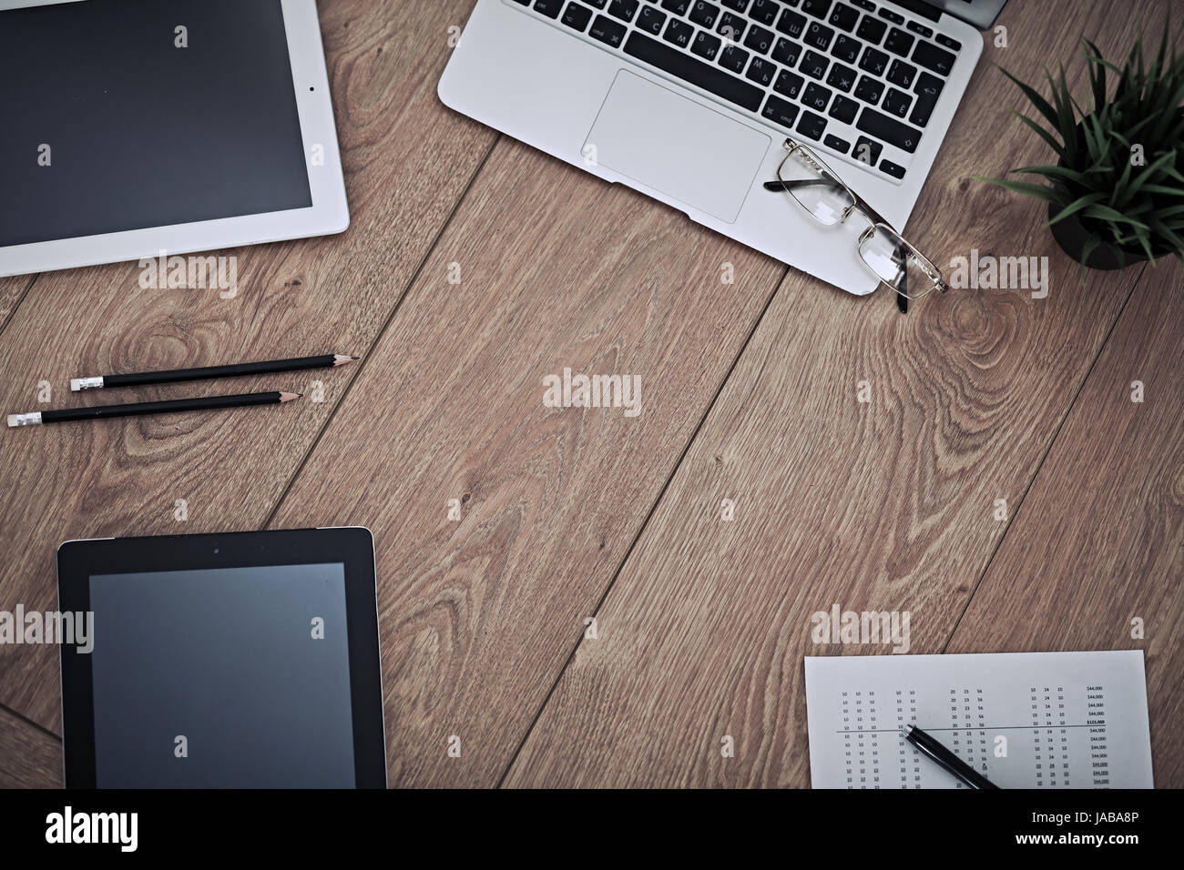 Office workplace with a laptop and documents Stock Photo - Alamy